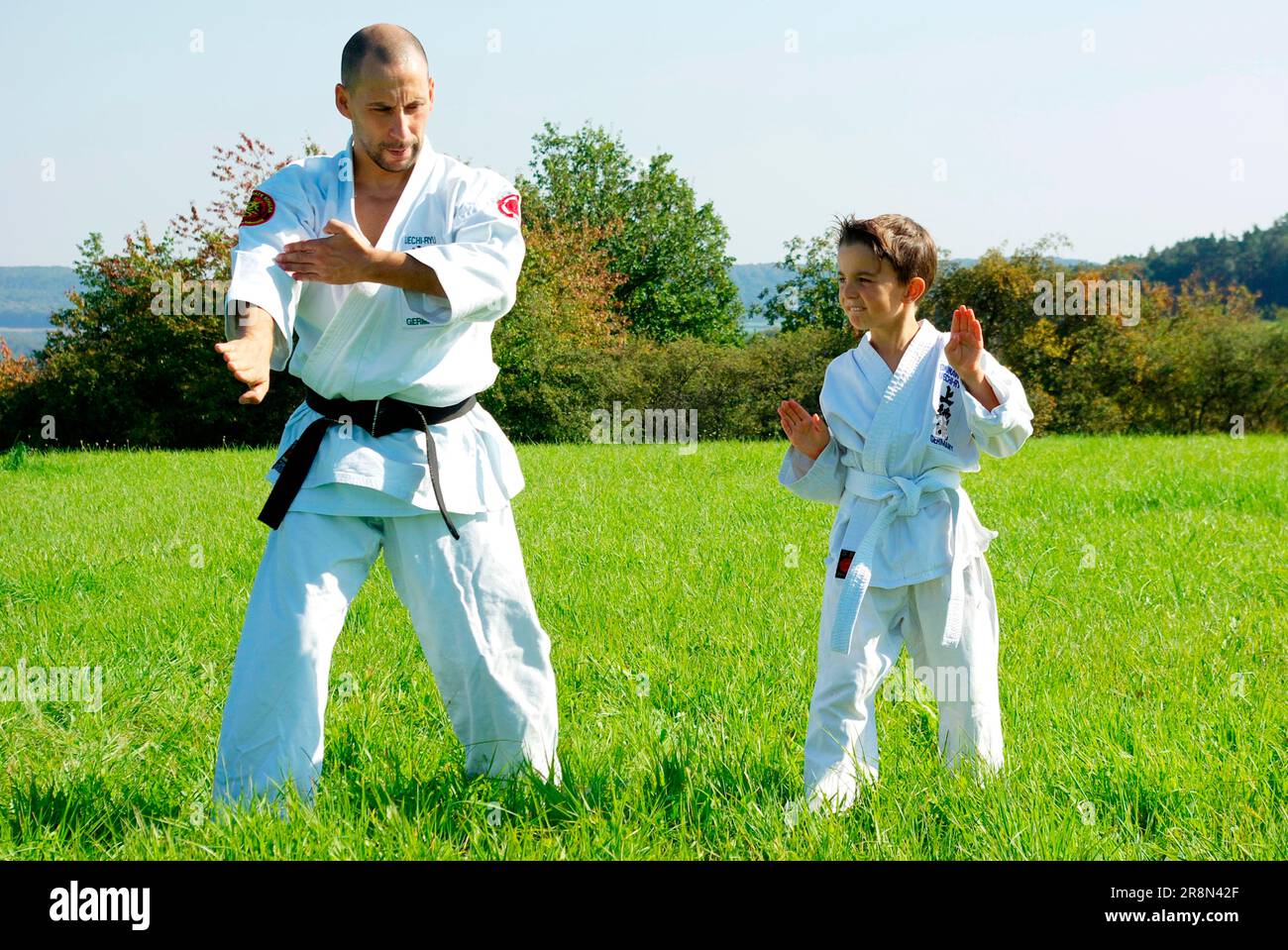Karate student with karate teacher, karate, student, teacher, martial ...