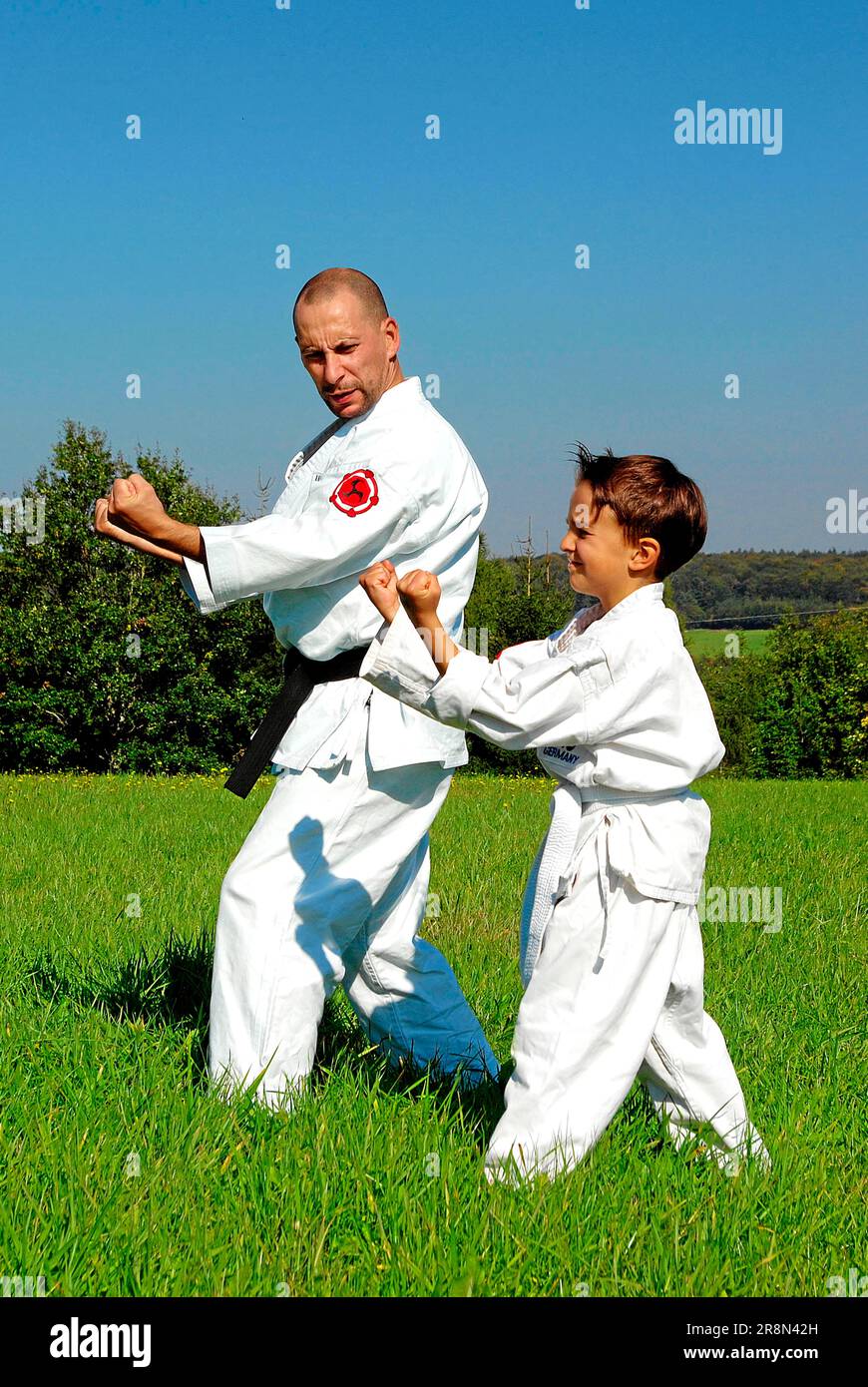 Karate student with karate teacher, karate, student, teacher, martial ...