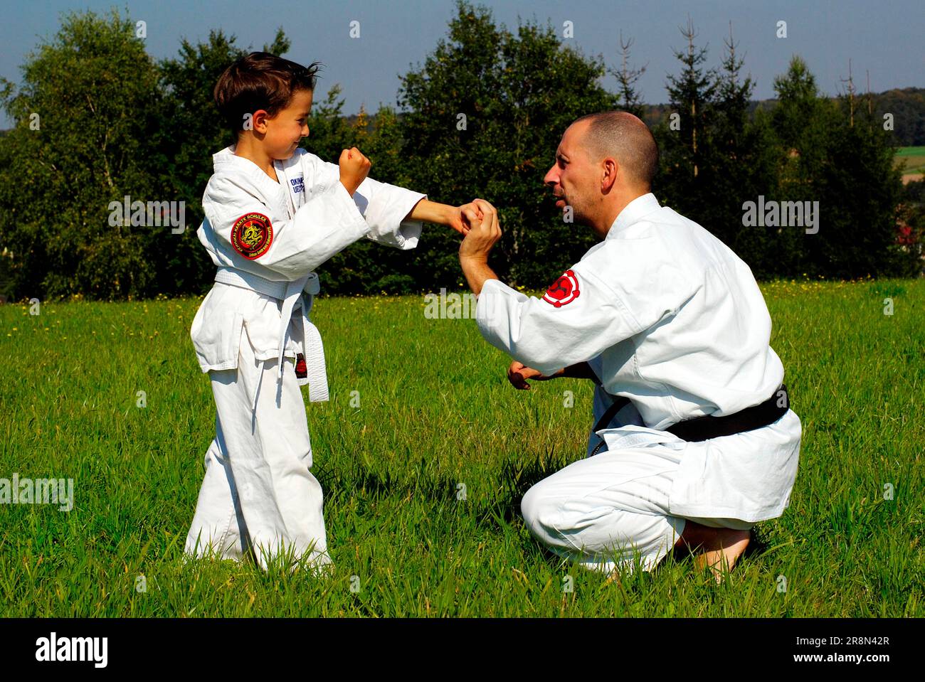 Karate student with karate teacher, karate, student, teacher, martial ...
