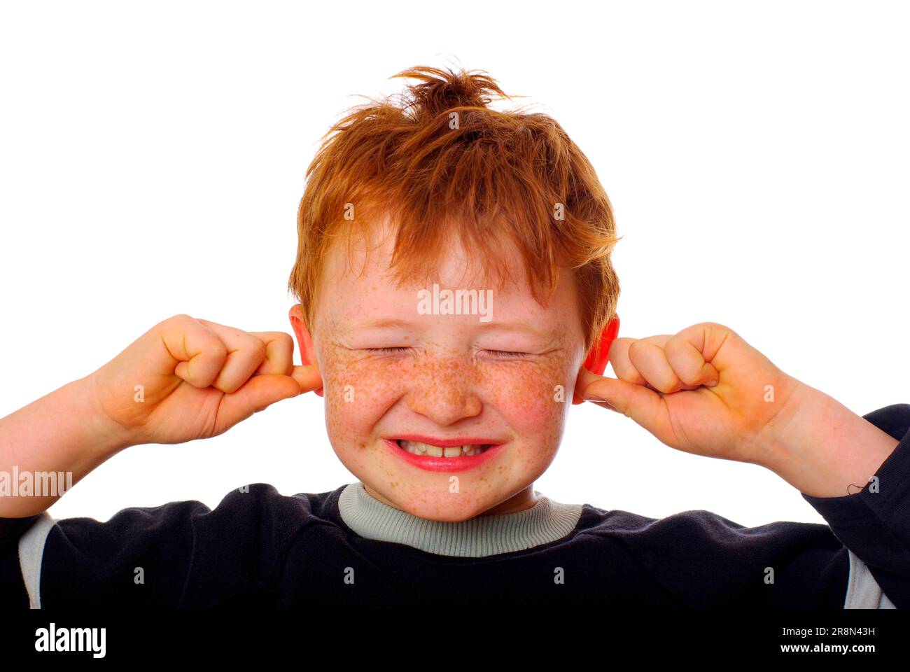 Child finger in ear hi-res stock photography and images - Alamy