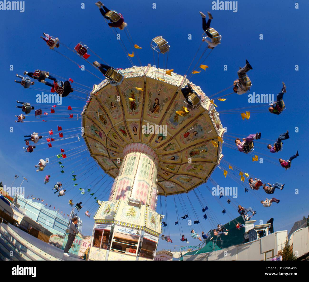 Chain carousel at the folk festival Stock Photo - Alamy