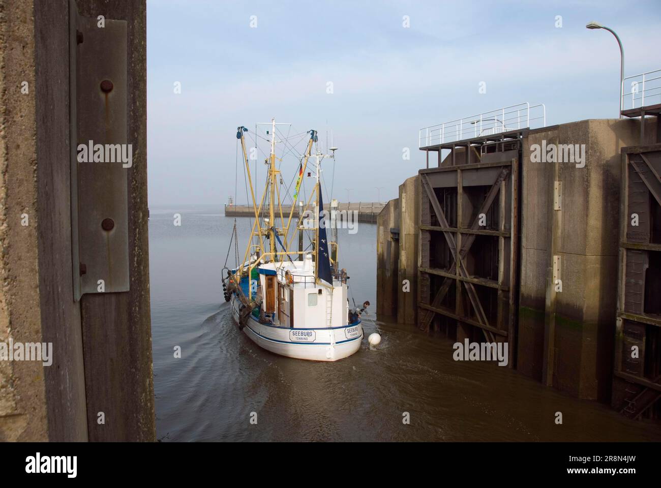 Ship 'Seeburg' in lock, barrage, coastal protection, Eider barrage, at ...
