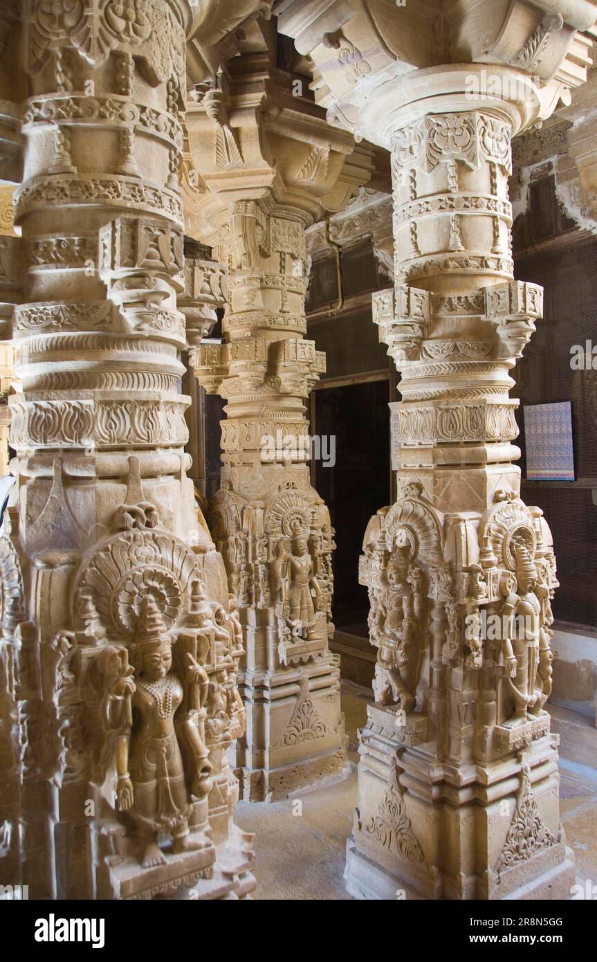 Carved columns, Jain temple, Jaisalmer, Rajasthan, India Stock Photo ...