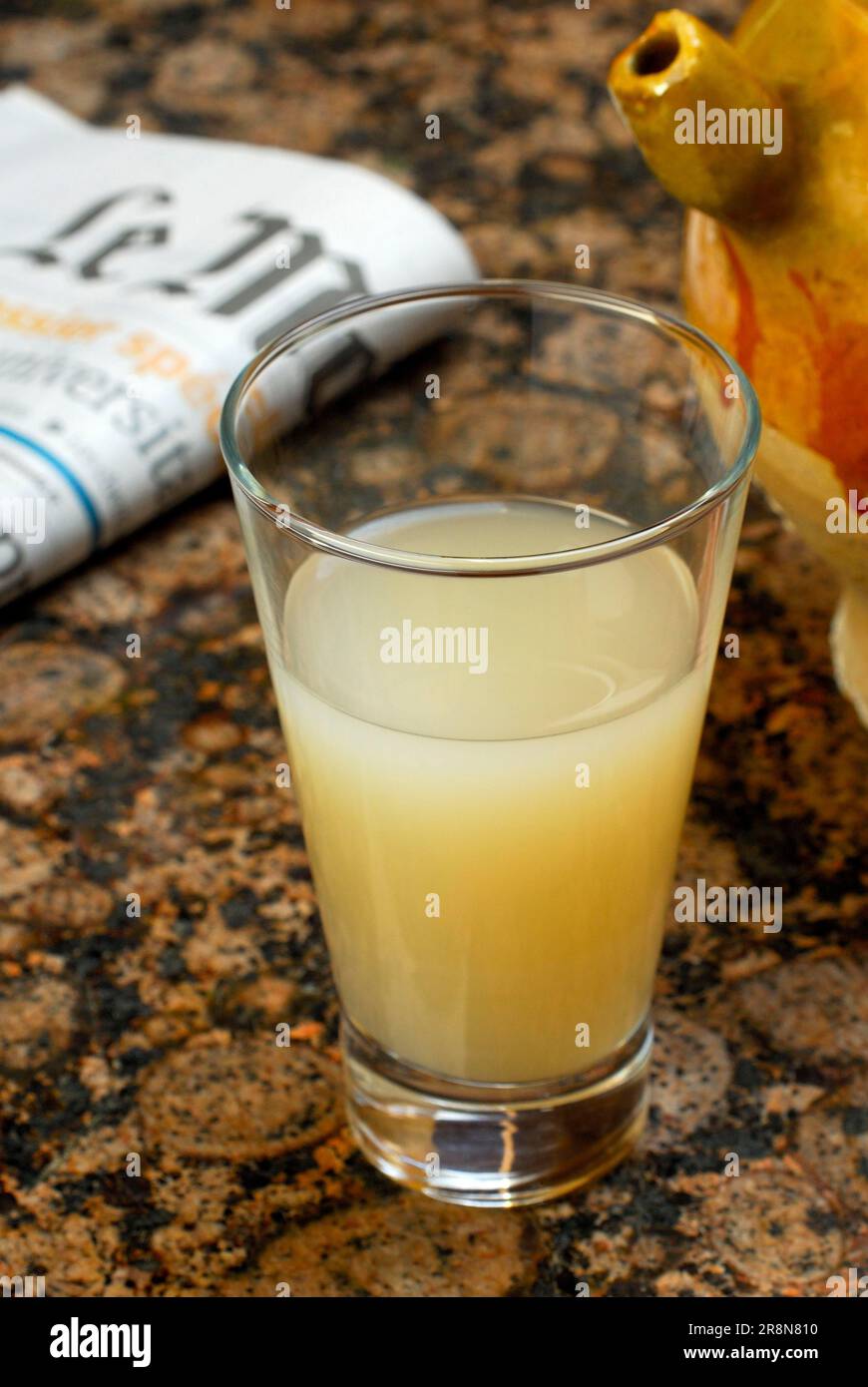 Glass of pastis and newspaper, French aniseed brandy, aperitif Stock ...