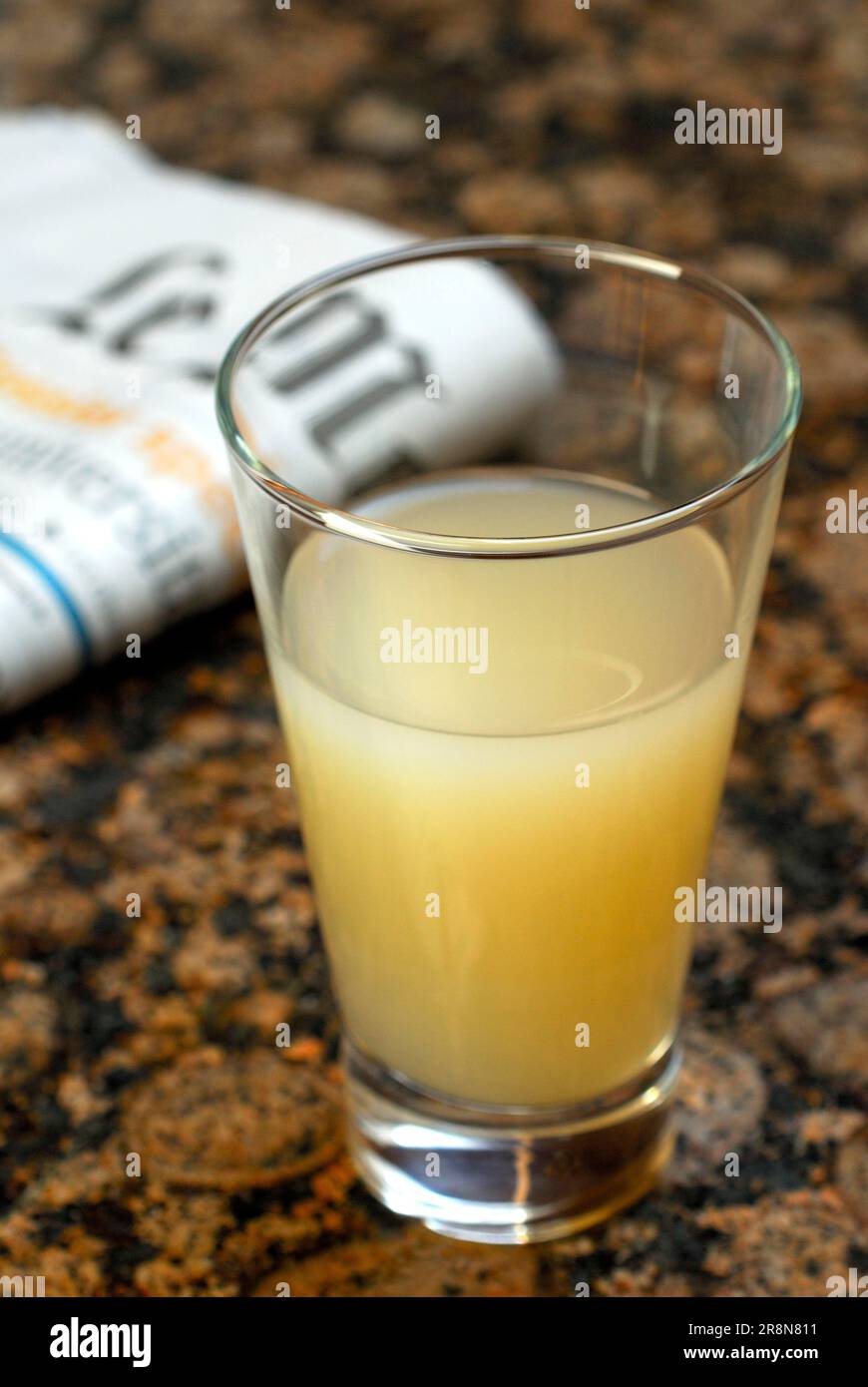 Glass of pastis and newspaper, French aniseed brandy, aperitif Stock ...