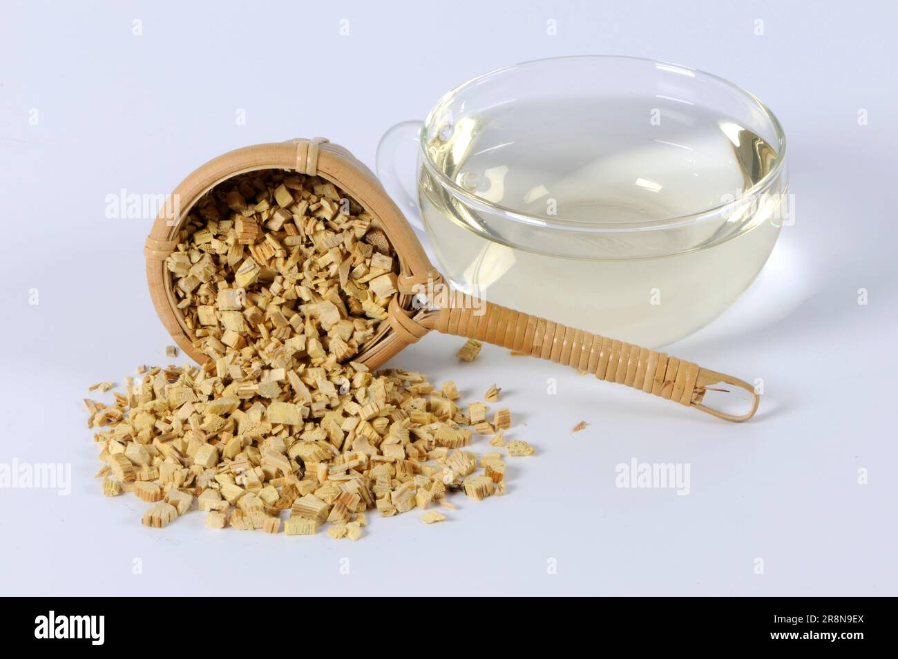 Cup of tea with stems of (Clematis) armandii (Caulis Clematidis ...