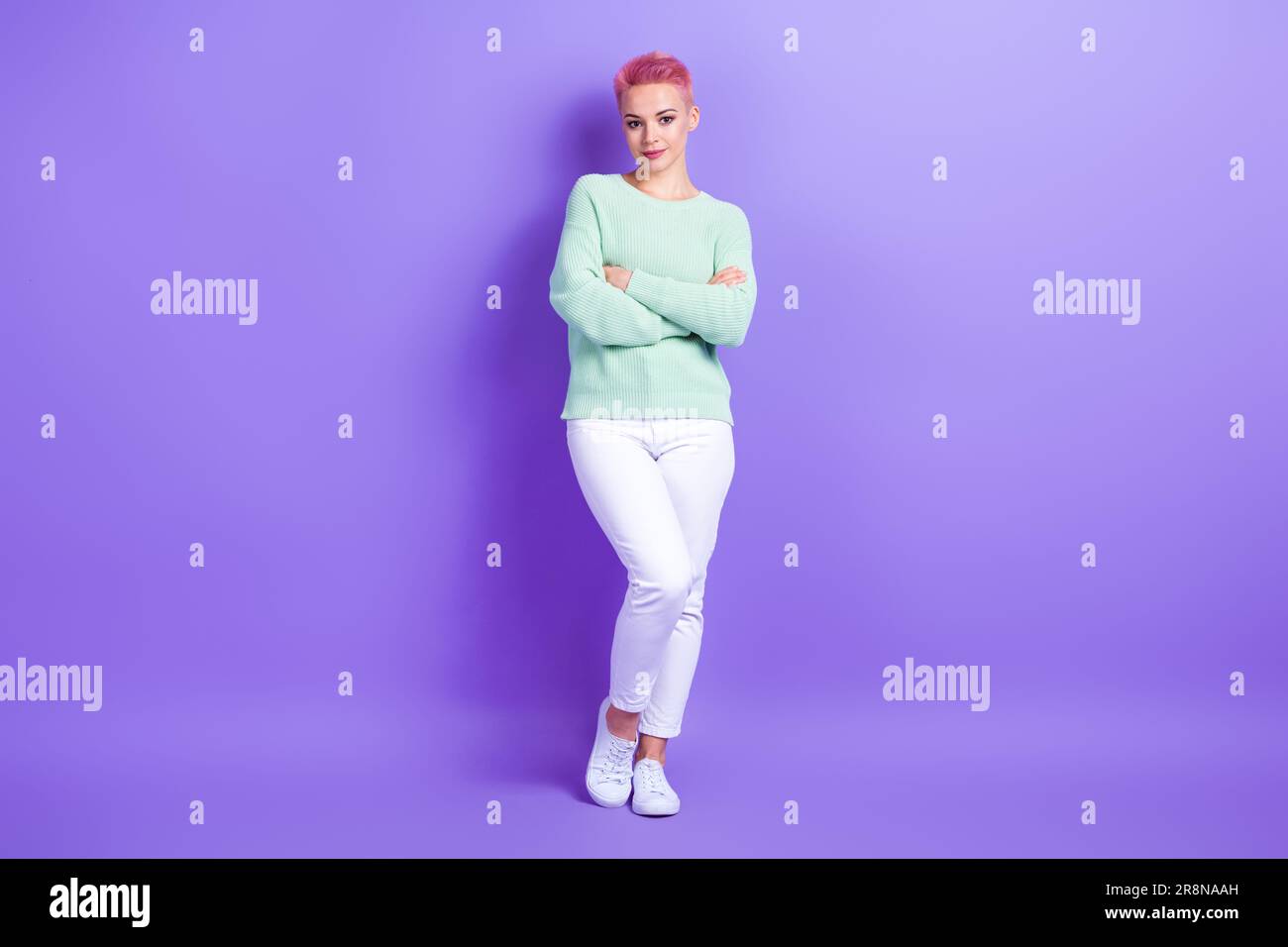 Full body photo of successful pretty positive lady folded hands posing ...