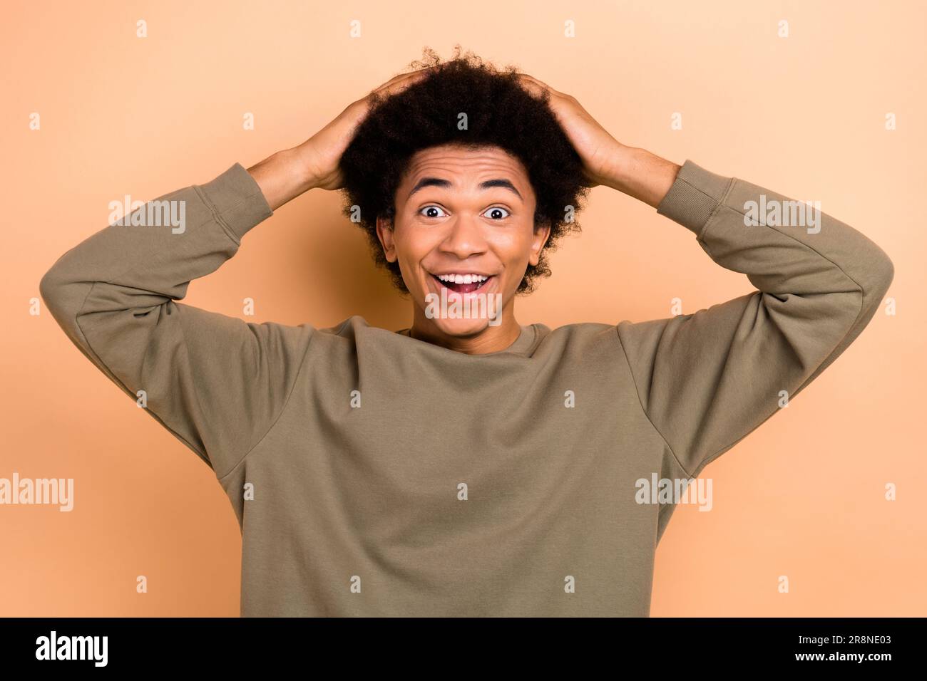 Closeup portrait hands head confused funny man chevelure surprised ...