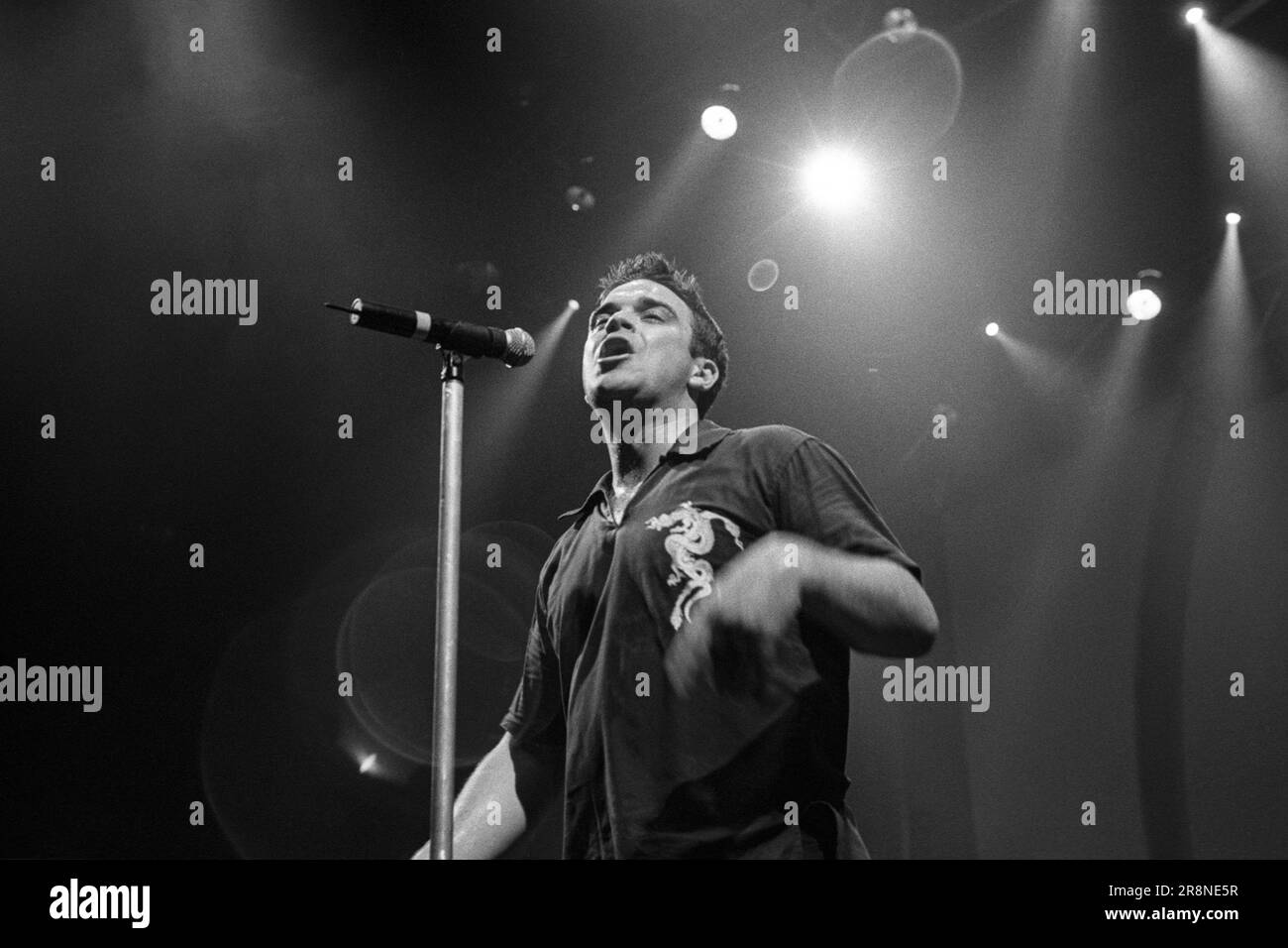 ROBBIE WILLIAMS, CARDIFF, 1999: Robbie Williams on his One More For The ...