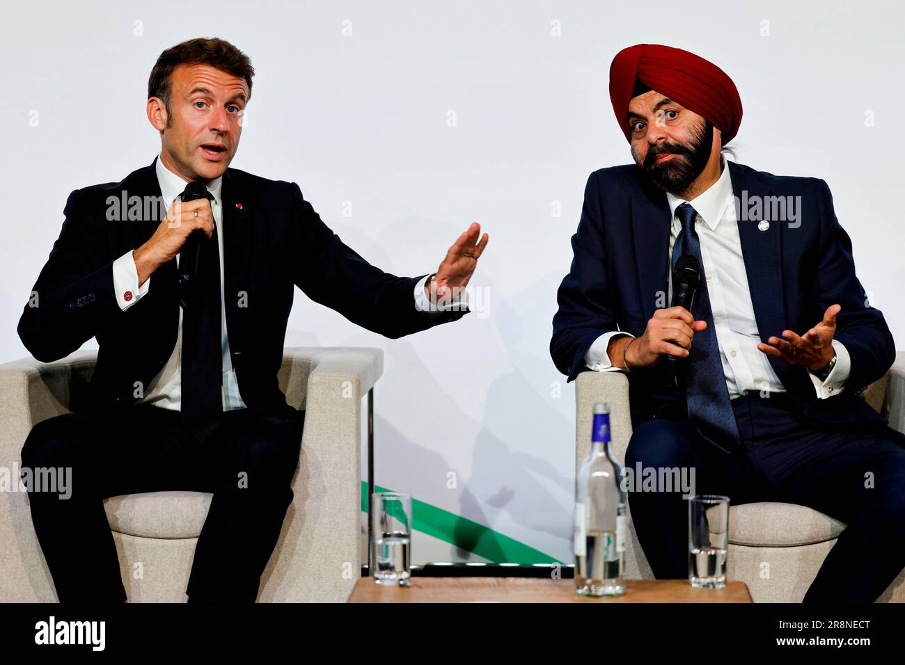 French President Emmanuel Macron, left, attends a conference with World ...