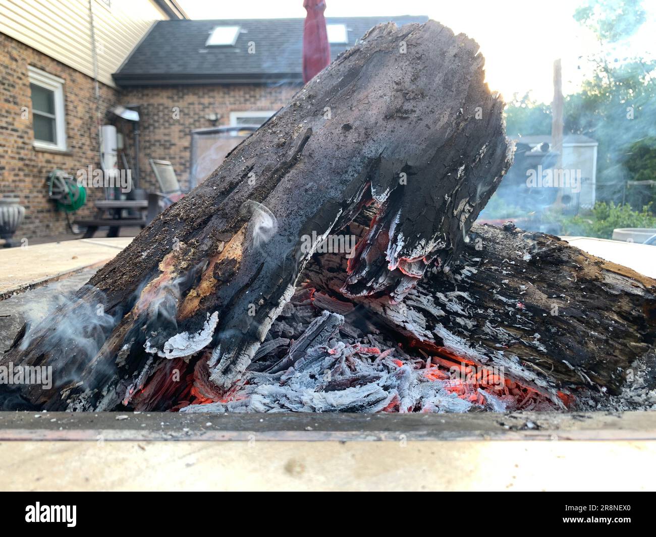 Bonfire burning night logs in hi-res stock photography and images - Alamy