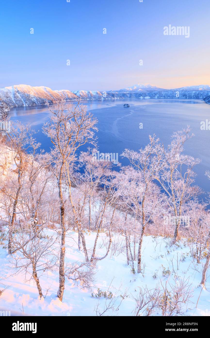 Mashu Ko's foggy ice under the morning sun Stock Photo - Alamy