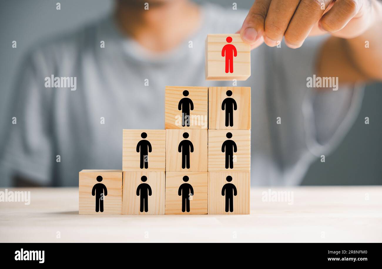 A red manager icon that stands out distinctively from a group of staff ...