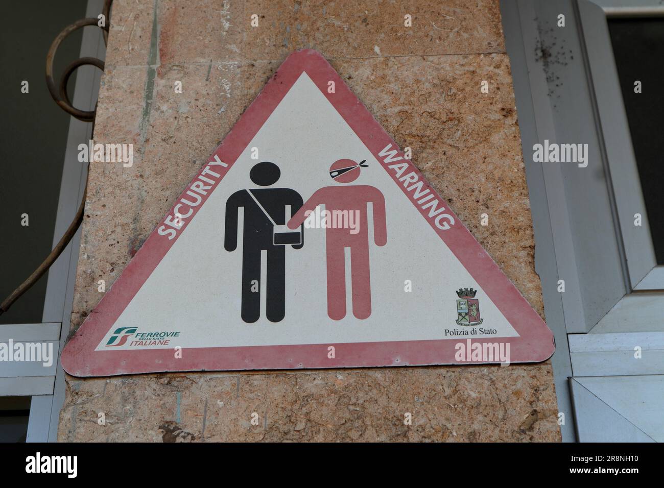 sign warning about the presence of pickpockets Stock Photo - Alamy