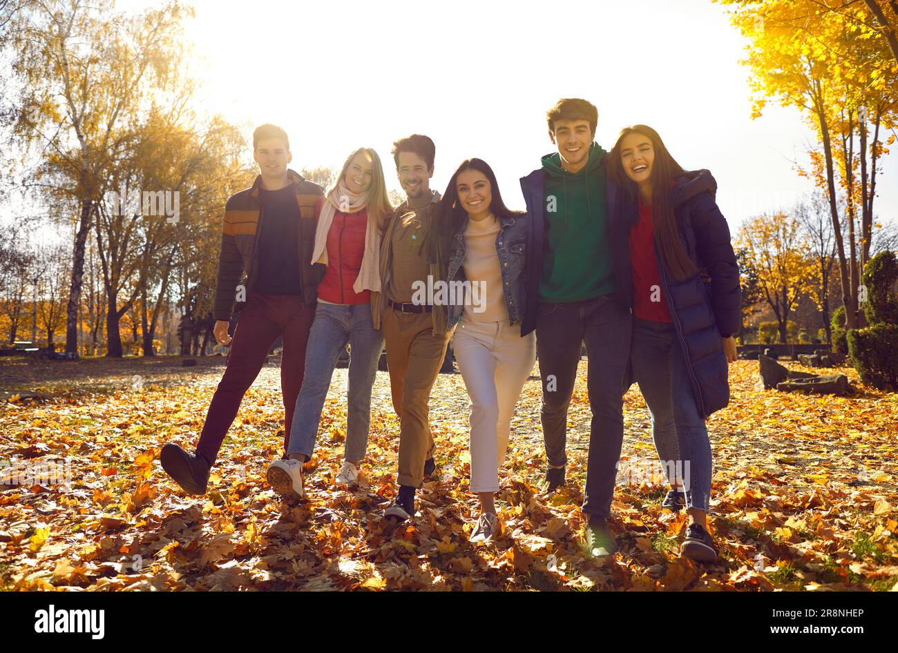 Six friends standing close to each other on nature Stock Photo - Alamy