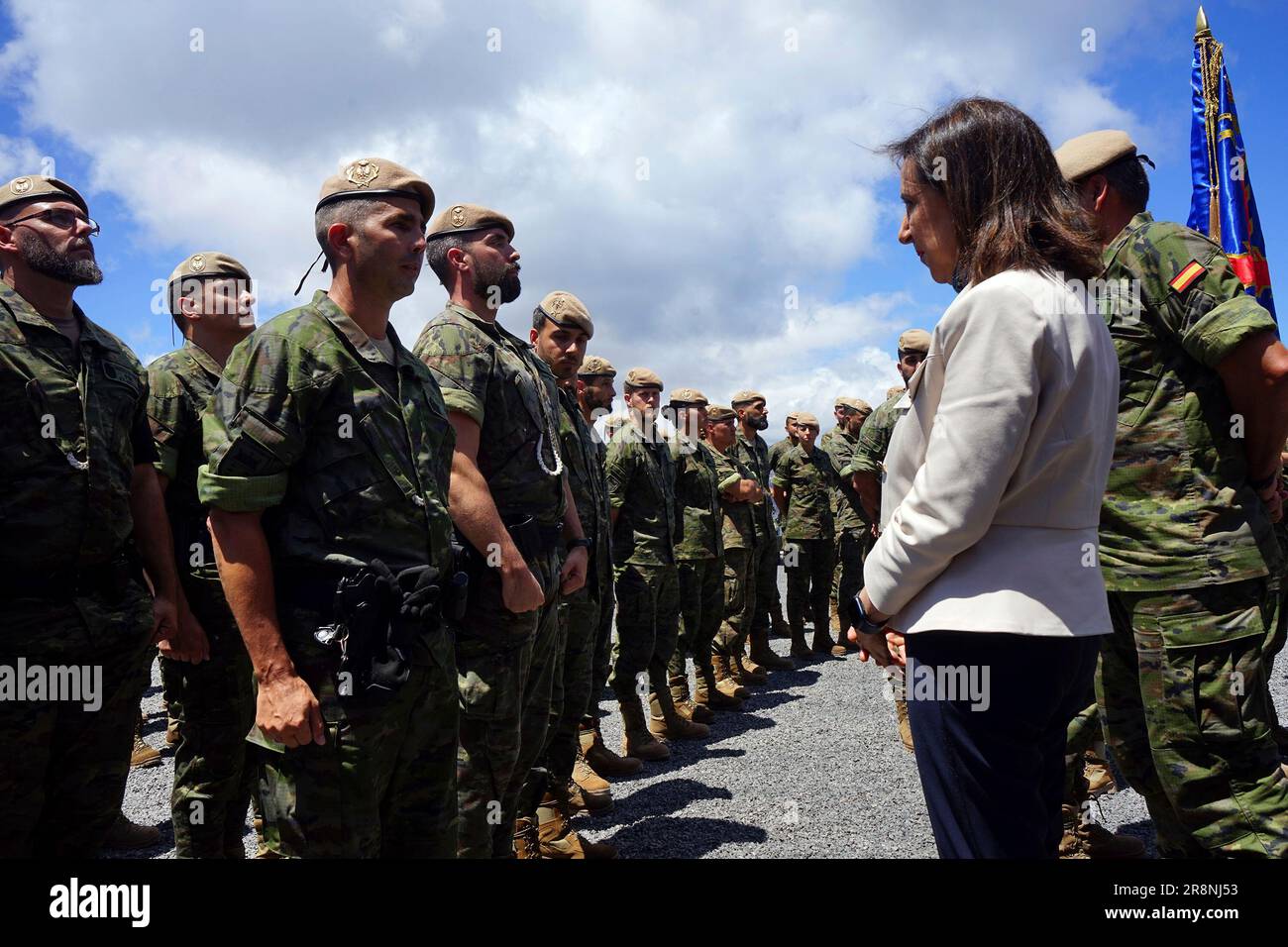 Defense Minister Margarita Robles talks with military personnel during ...