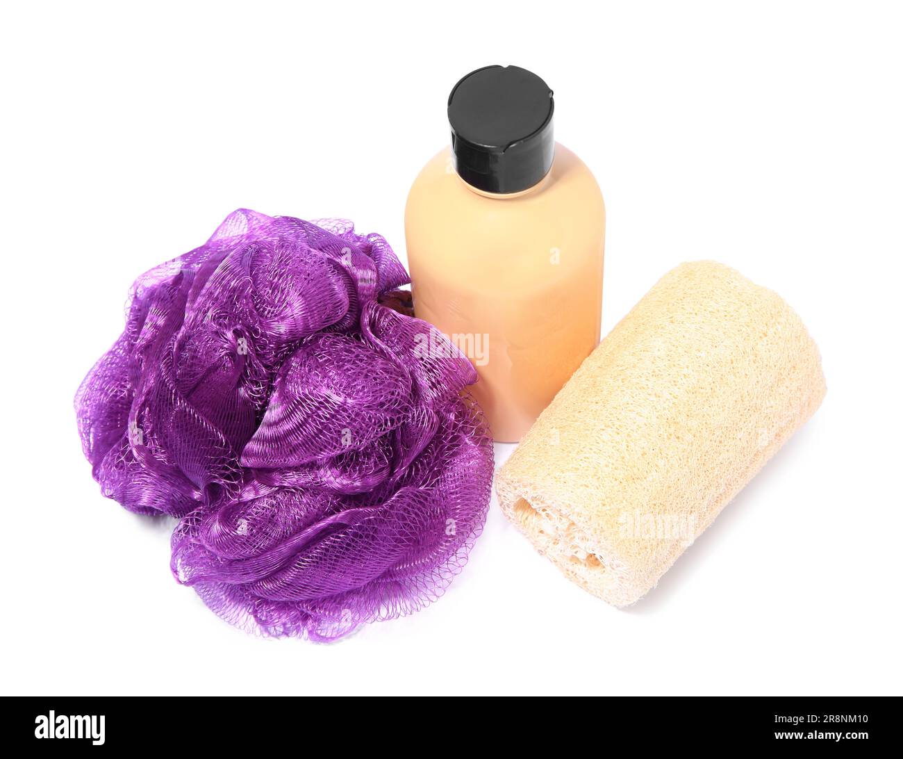 New shower puff, loofah sponge and bottle of cosmetic product on white ...