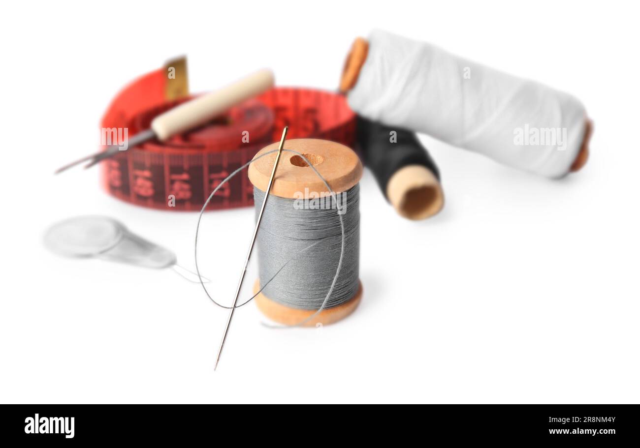 Set of sewing accessories on white background Stock Photo - Alamy