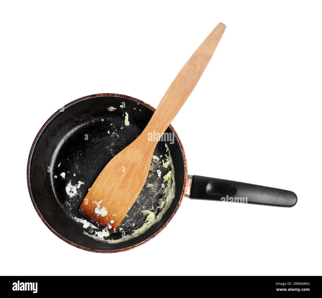 Dirty frying pan and wooden spatula on white background, top view Stock ...