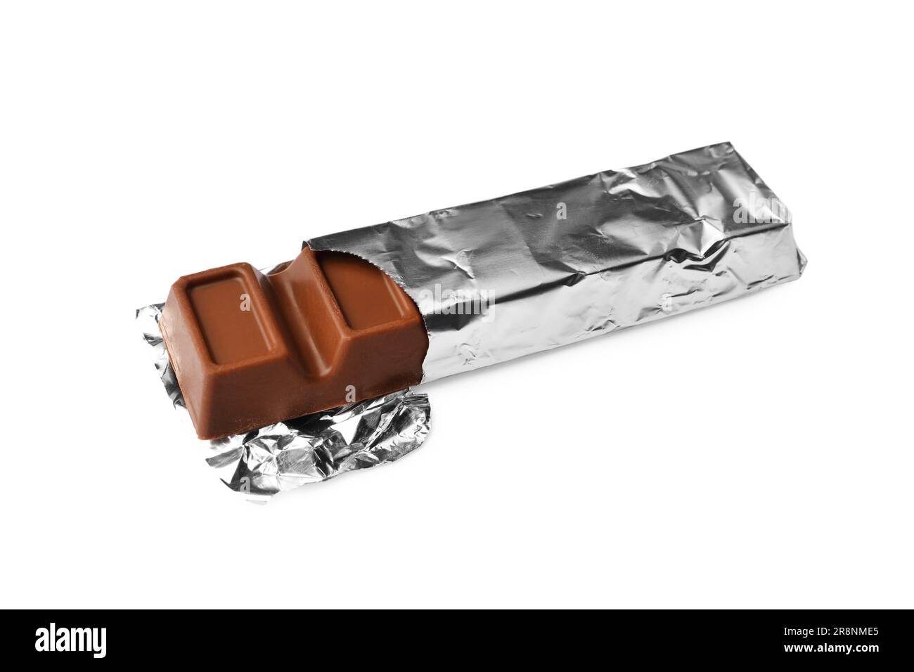 Delicious chocolate bar wrapped in foil on white background Stock Photo ...