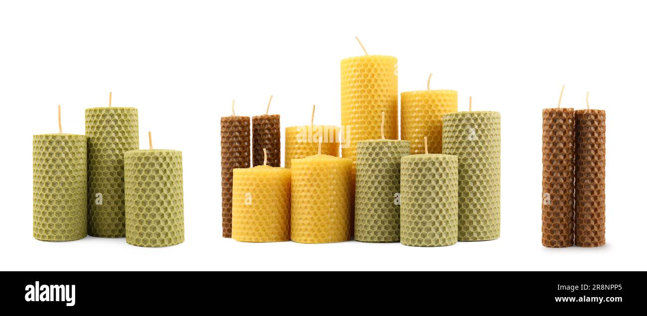 Set of beeswax candles on white background Stock Photo - Alamy
