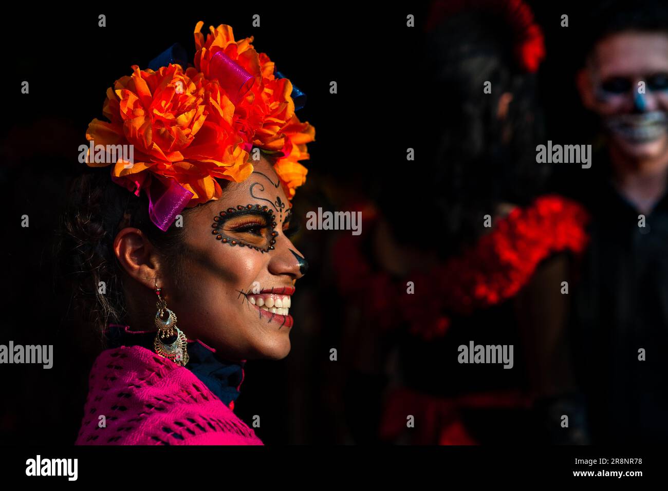 A young Mexican woman, dressed as La Catrina, takes part in the Day of ...