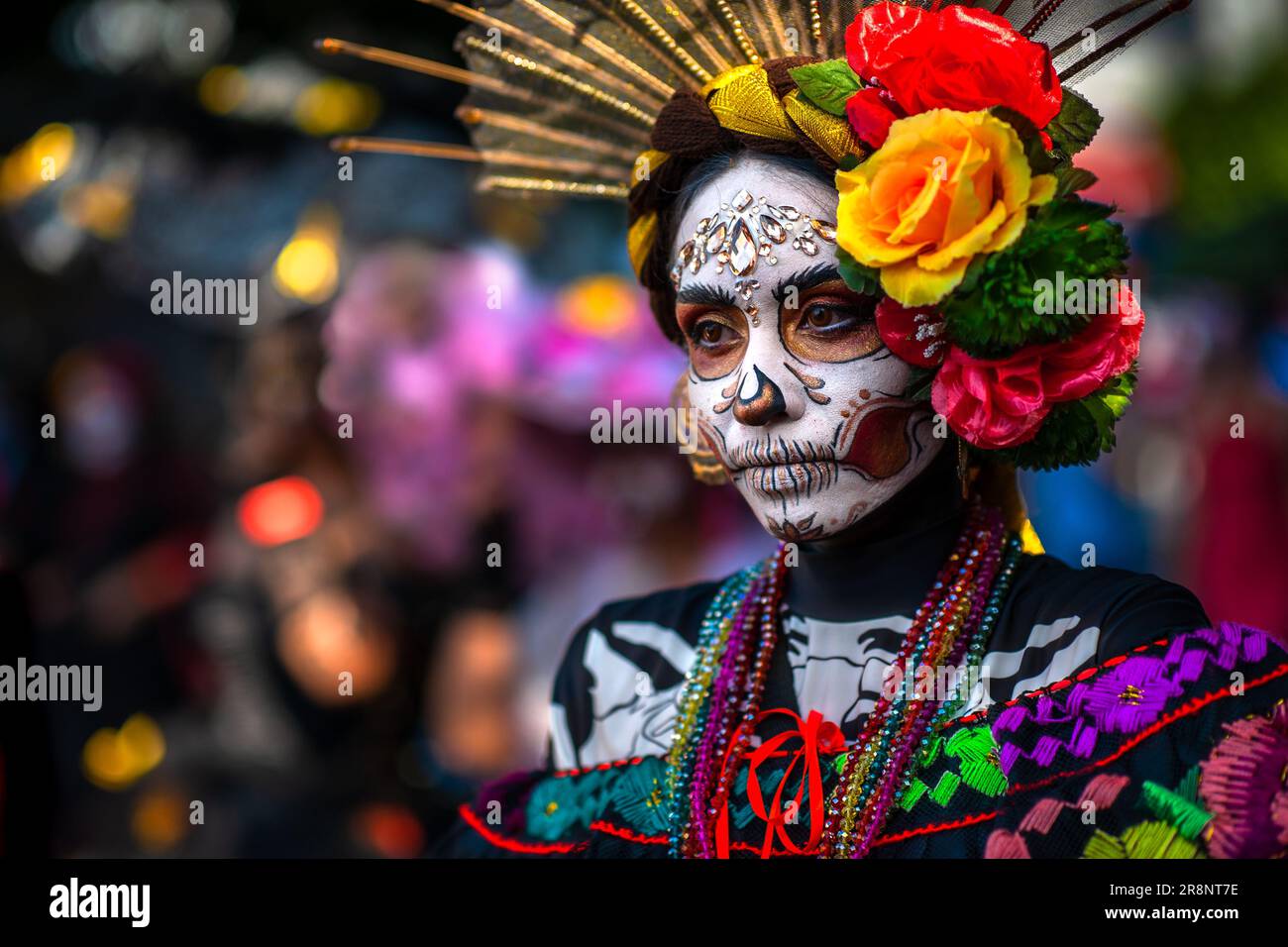 A young Mexican woman, dressed as La Catrina, takes part in the Day of ...