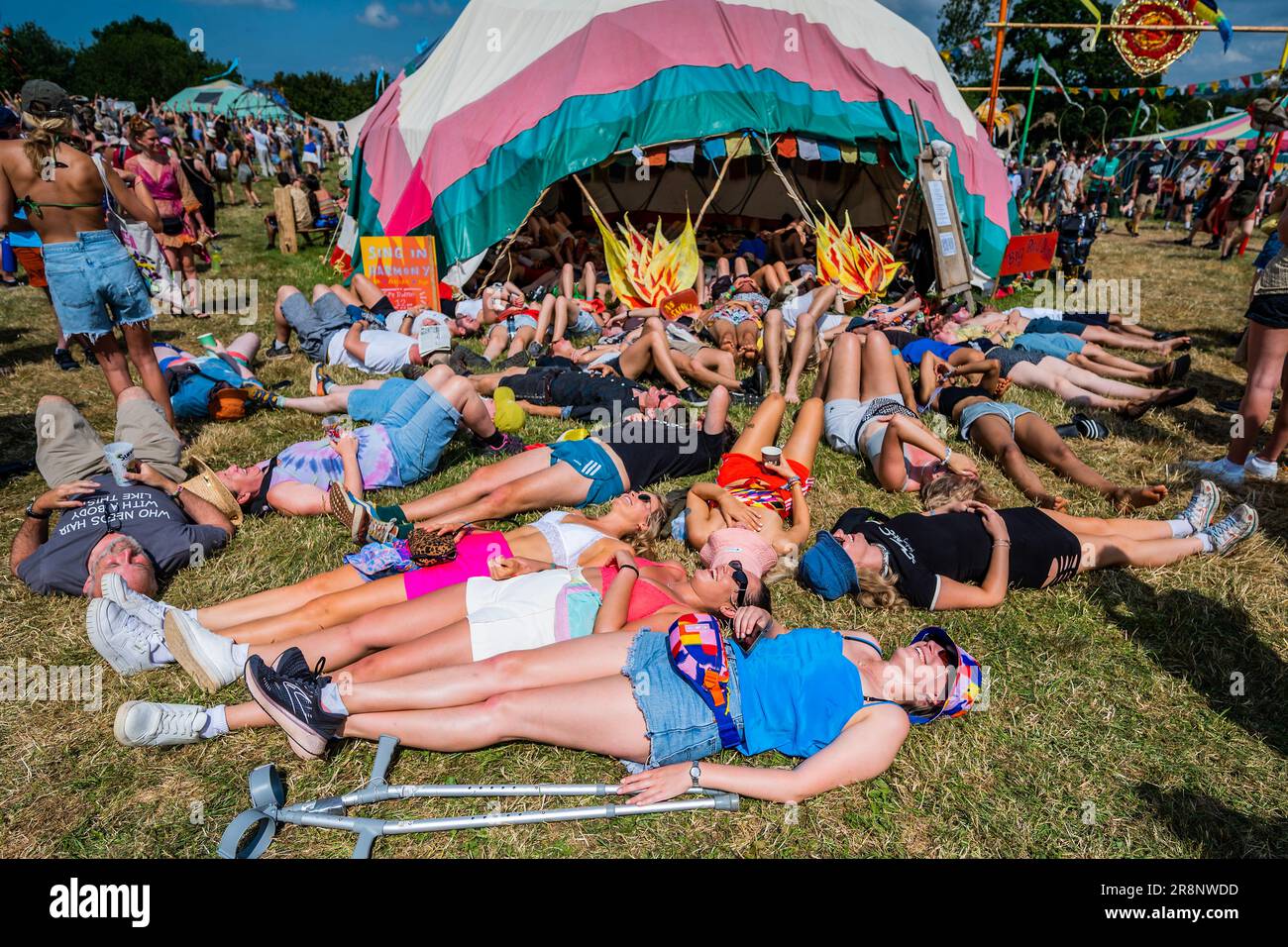 Glastonbury, UK. 22nd June, 2023. A laughter class spills out of the ...