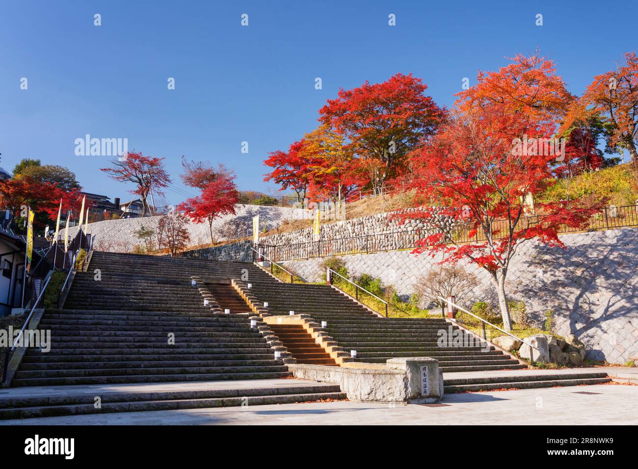 Stone steps street and colored autumn leaves of Ikaho Onsen Stock Photo ...