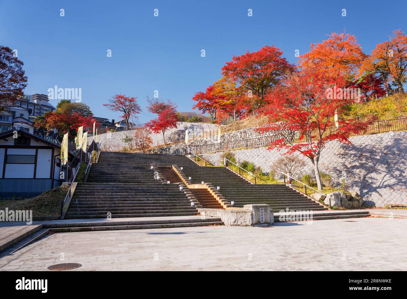 Stone steps street and colored autumn leaves of Ikaho Onsen Stock Photo ...