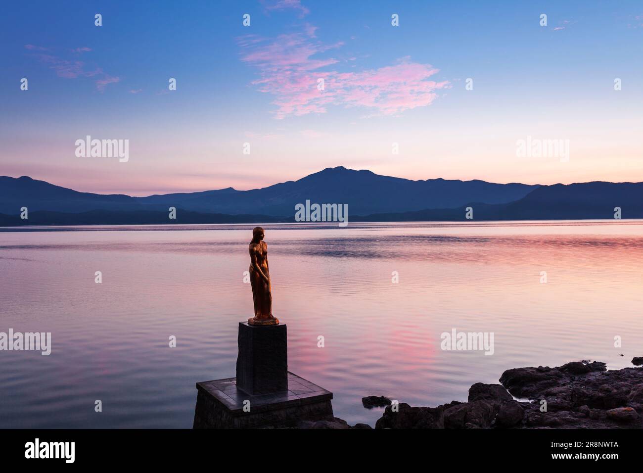 Statue of Tatsuko at Lake Tazawa and morning glow Stock Photo - Alamy