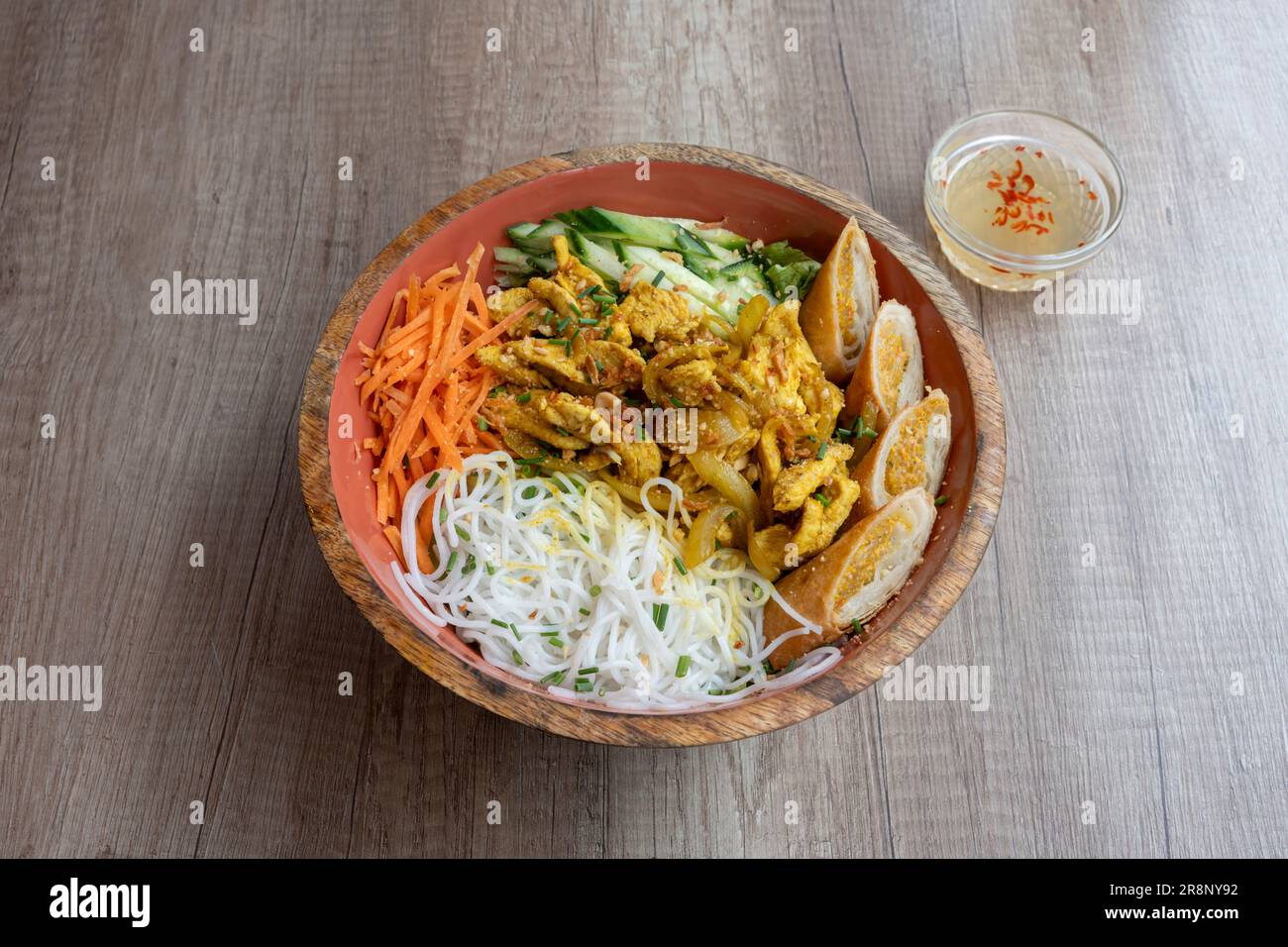 Asian dishe culinary Still Life. Bo bun with rice vermicelli, chicken ...