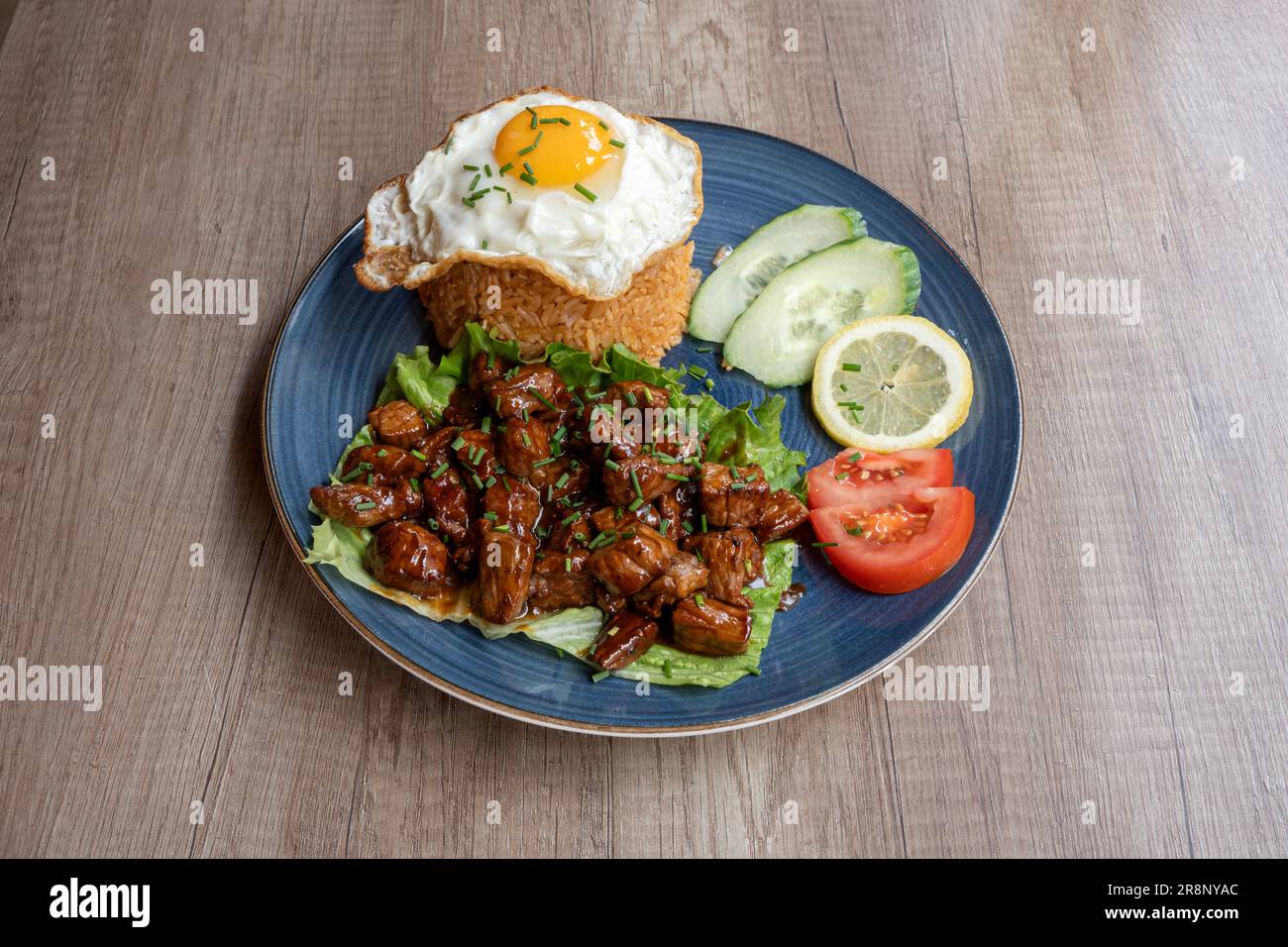 Asian dishe culinary Still Life. Loc Lac with minced beef stir-fried in ...