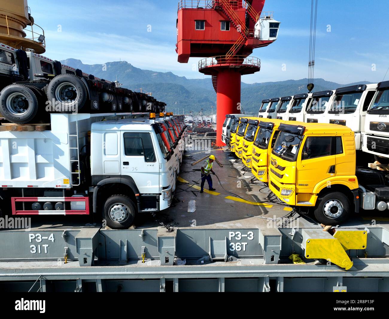 LIANYUNGANG, CHINA - JUNE 22, 2023 - Dock workers work at the berth of ...
