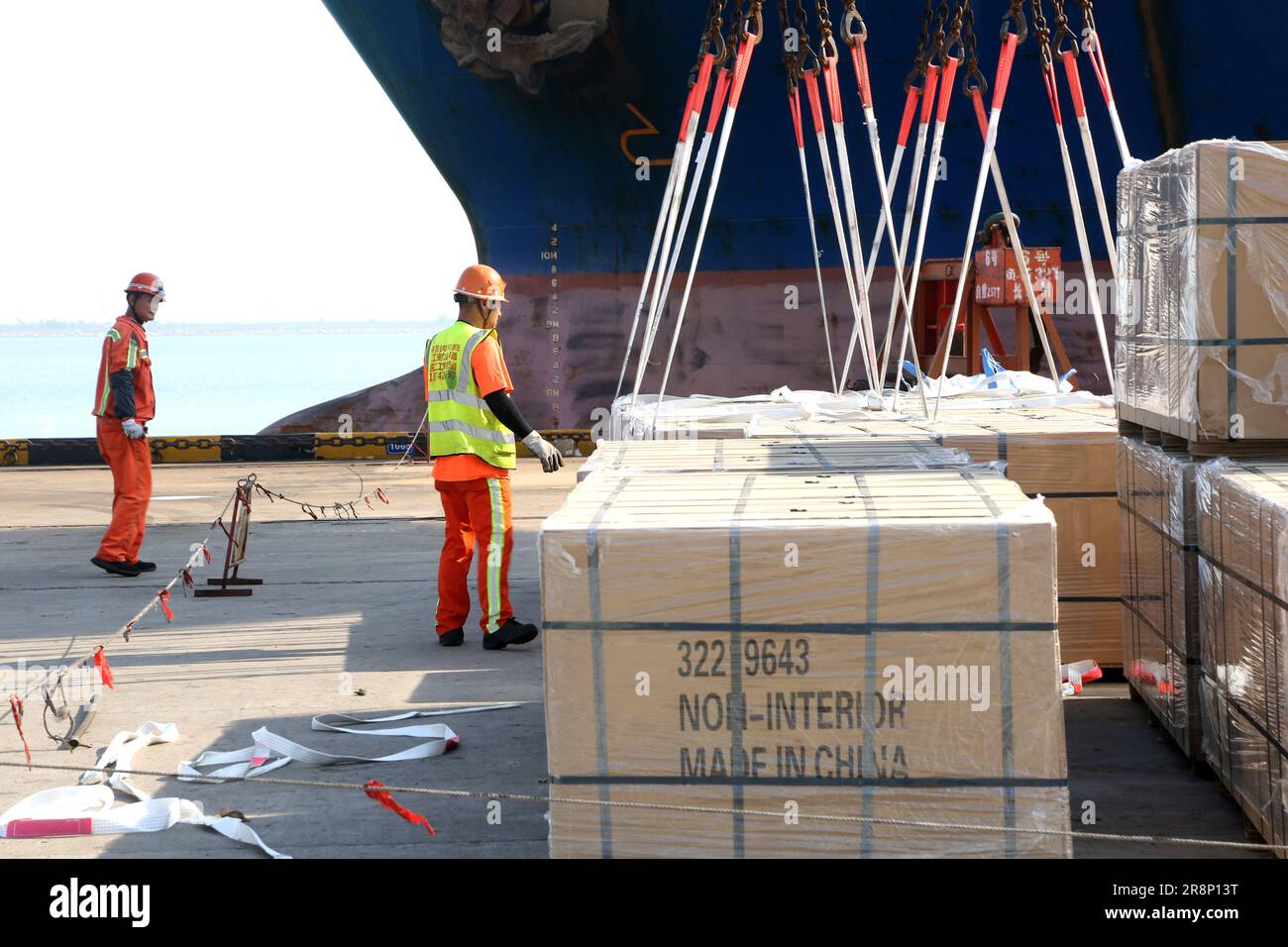 LIANYUNGANG, CHINA - JUNE 22, 2023 - Dock workers work at the berth of ...