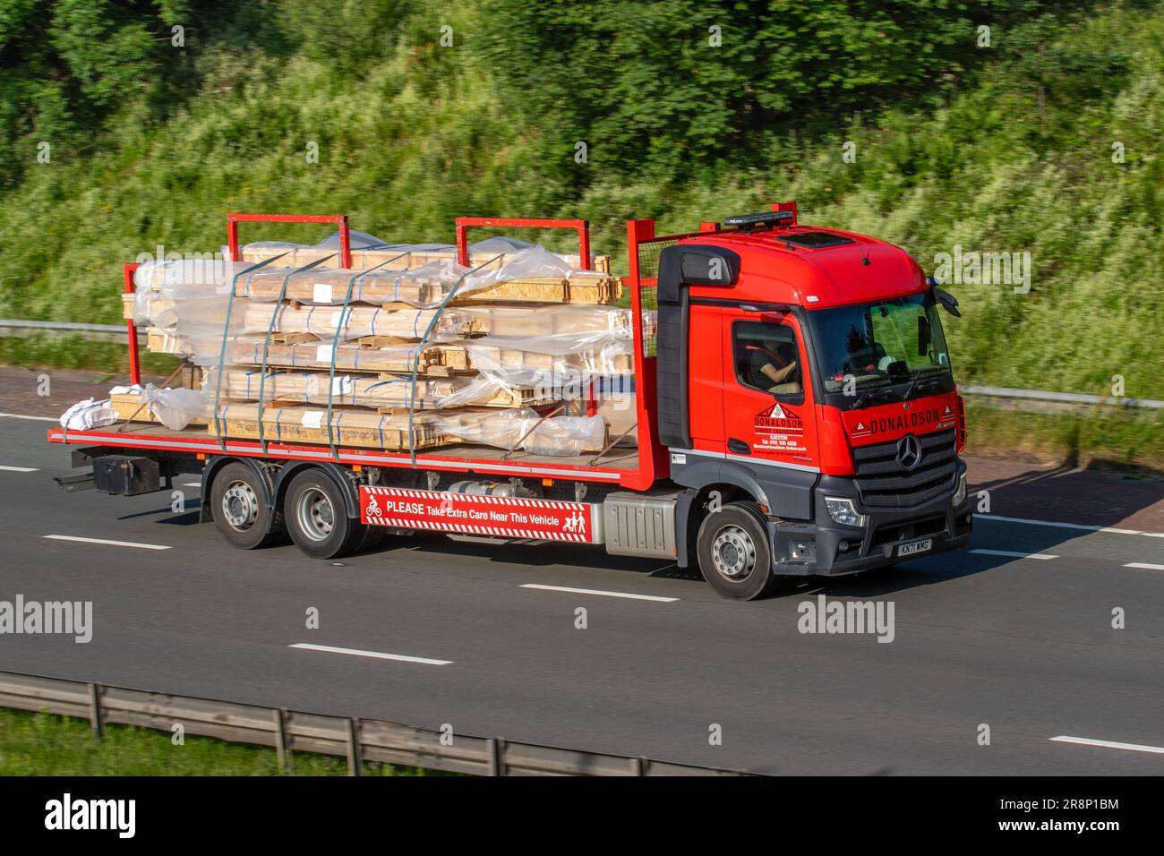 Donaldson Timber Engineering flat-bed lorry carrying machined timber ...