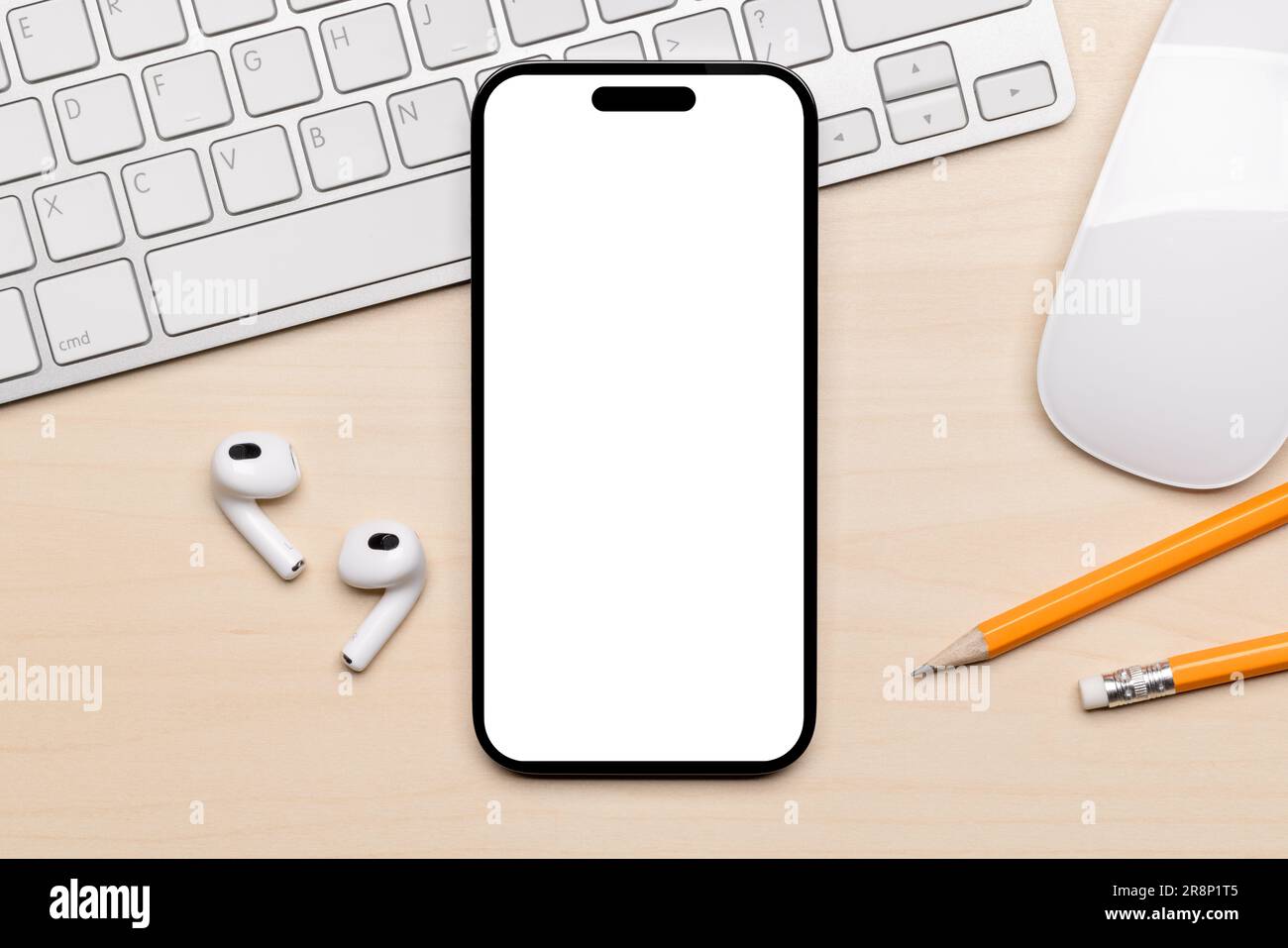 Blank white screen smartphone on a desk, perfect for your design mockup ...