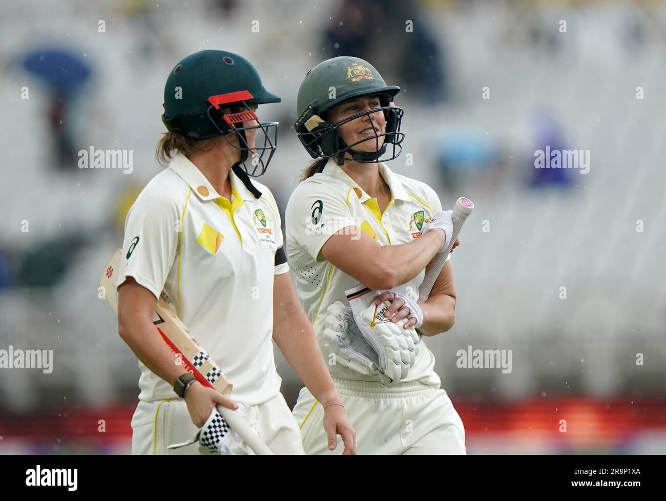 Australia's Jess Jonassen (left) and Ellyse Perry leave the field as ...