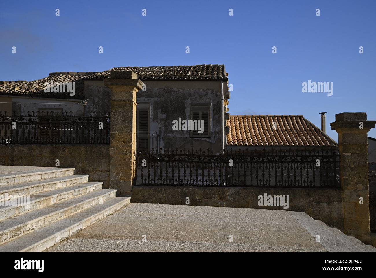 Old Neoclassical house with an antique terra cotta clay tile rooftop in ...