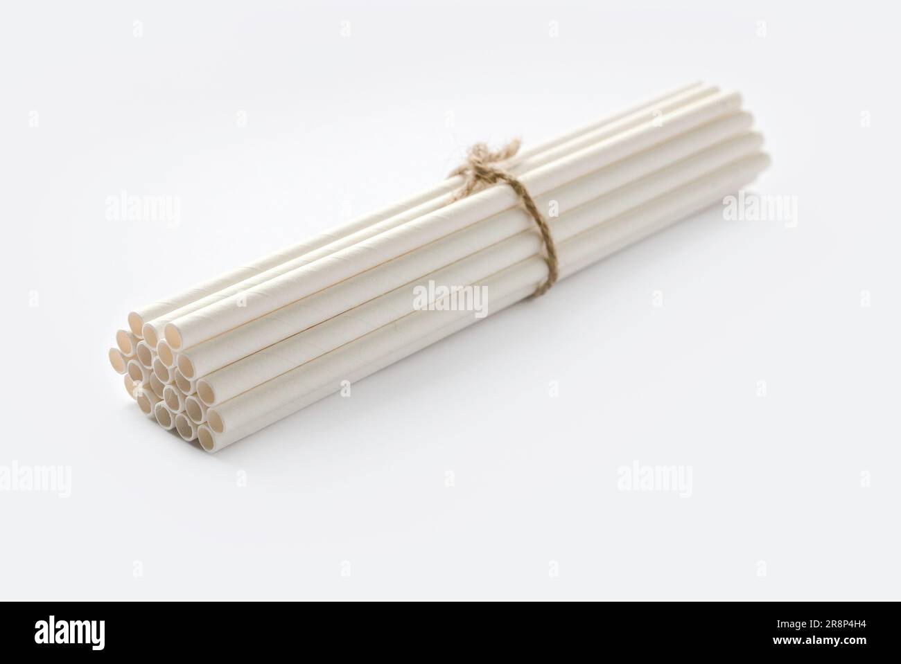 Biodegradable eco friendly white paper drinking straw isolated on white ...