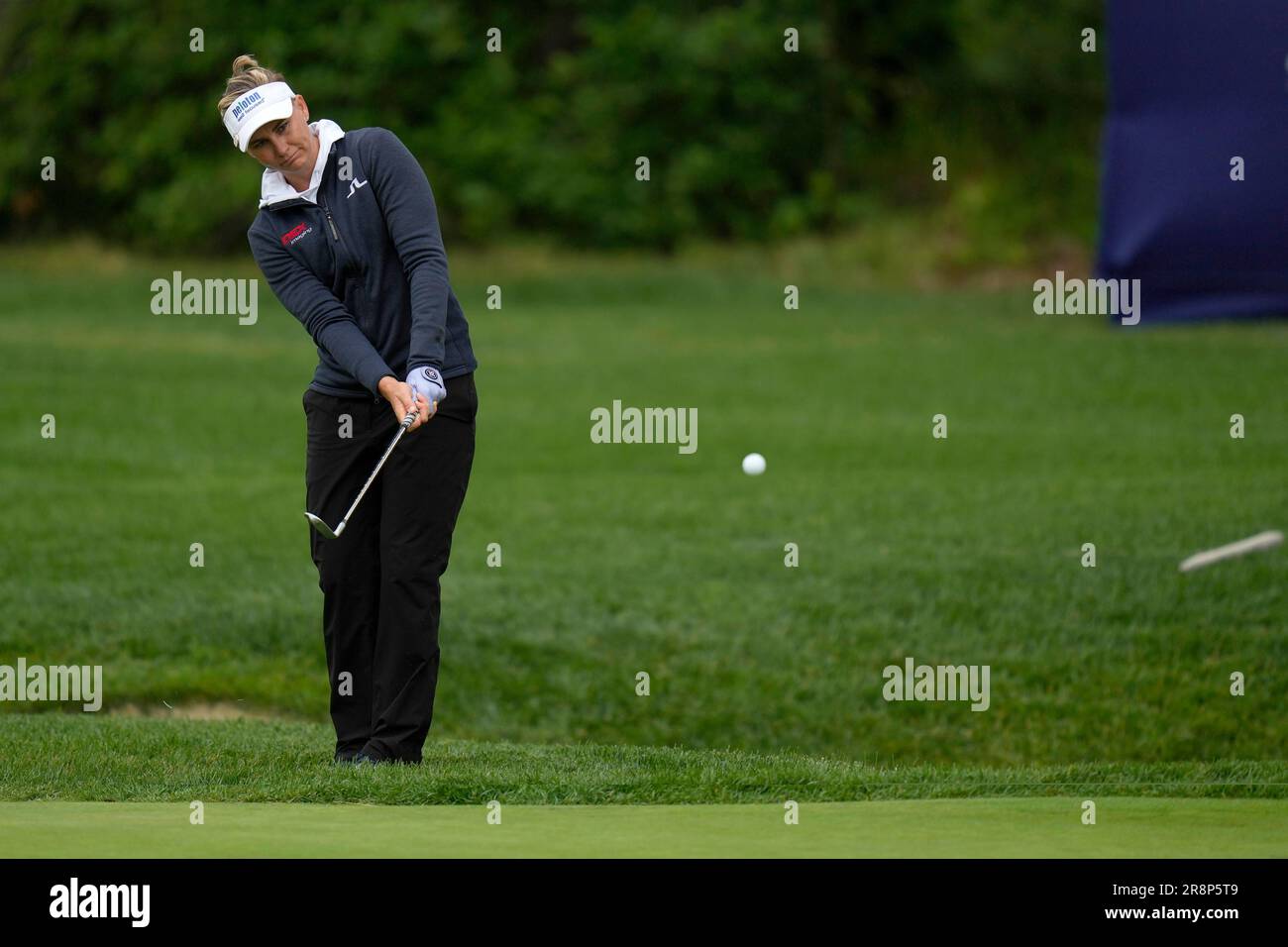 Ryann O'Toole chips onto the green on the 13th hole during the first ...