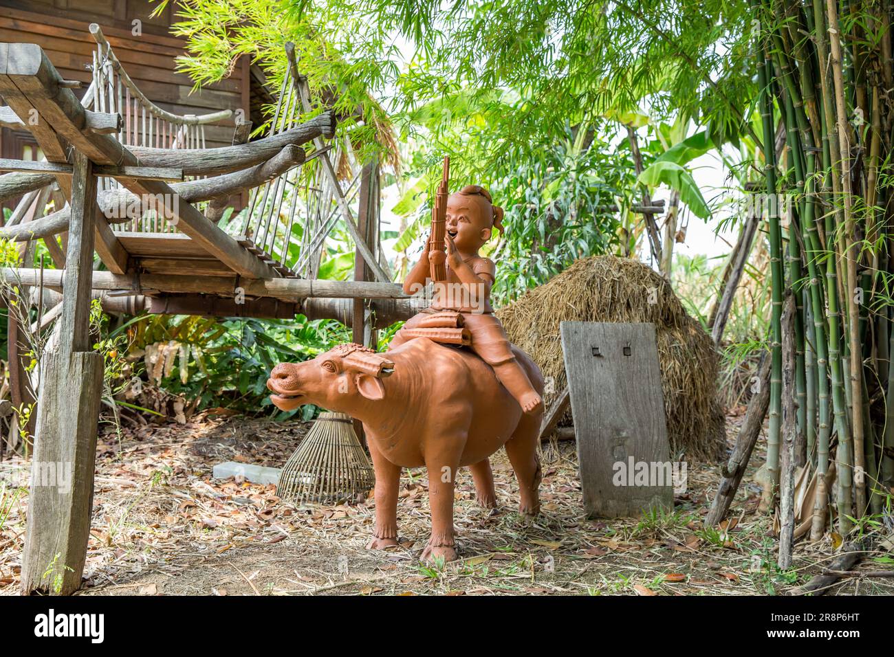 Statue of boy Who are riding many animals such as buffalo Stock Photo ...
