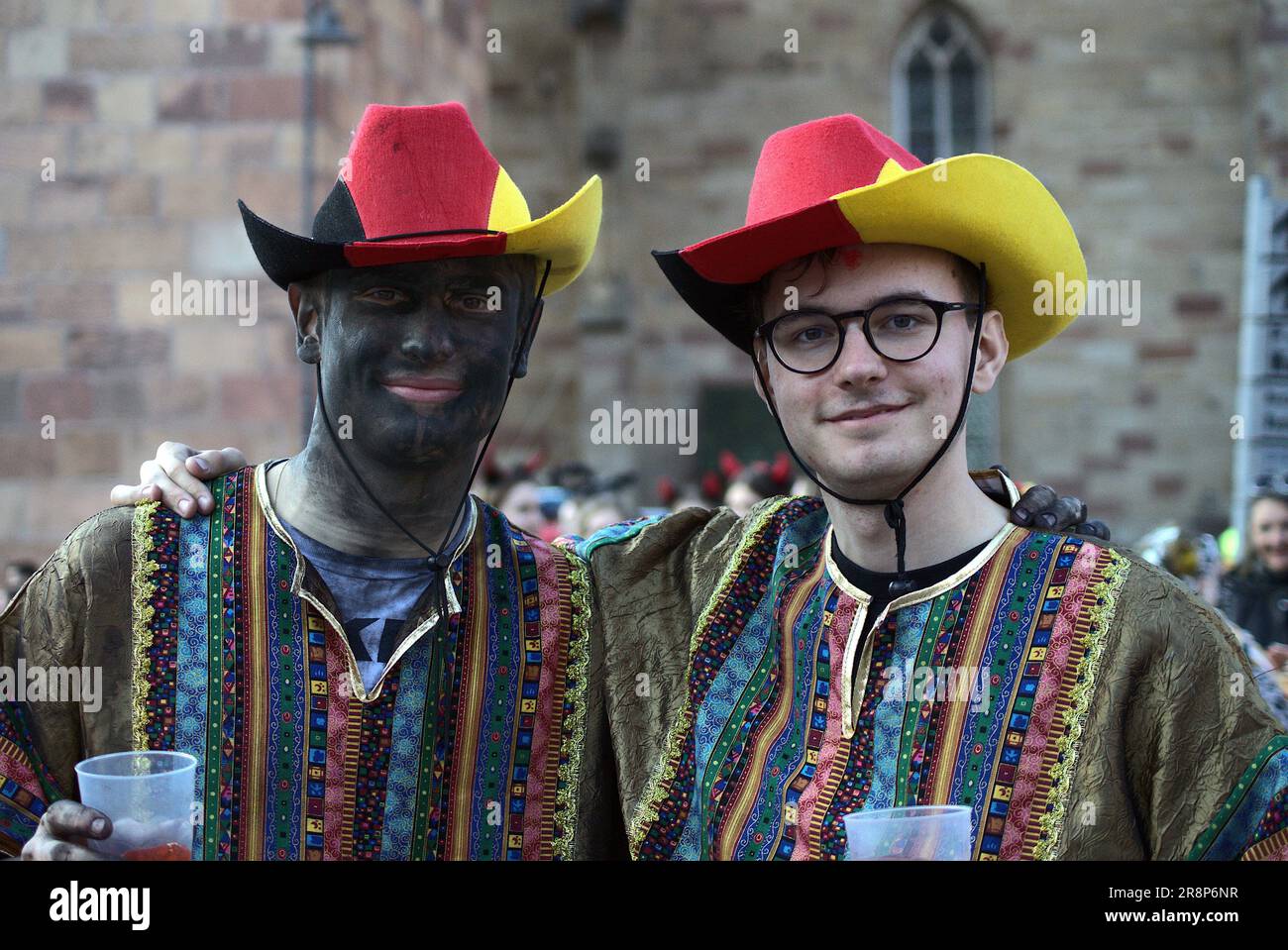 Carnival parade, Terlan - two young men posing for a picture dressed up ...