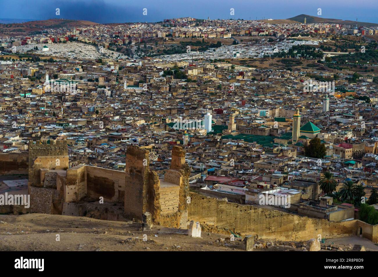 Morocco. Fez. View fron the hill above the old medina in Fez at dusk ...