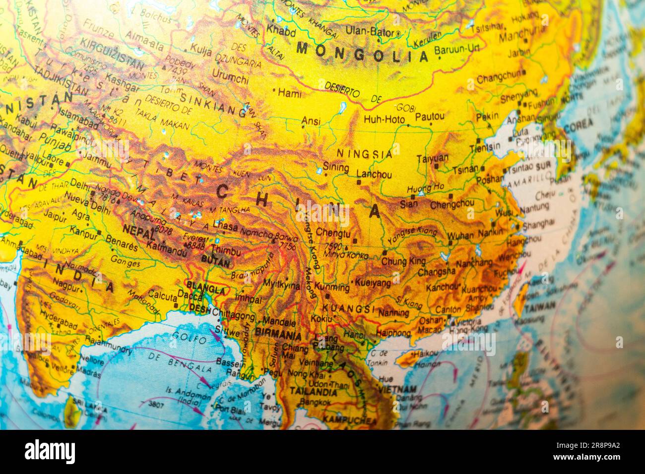 Closeup of a globe featuring a detailed map of the Asian continent ...