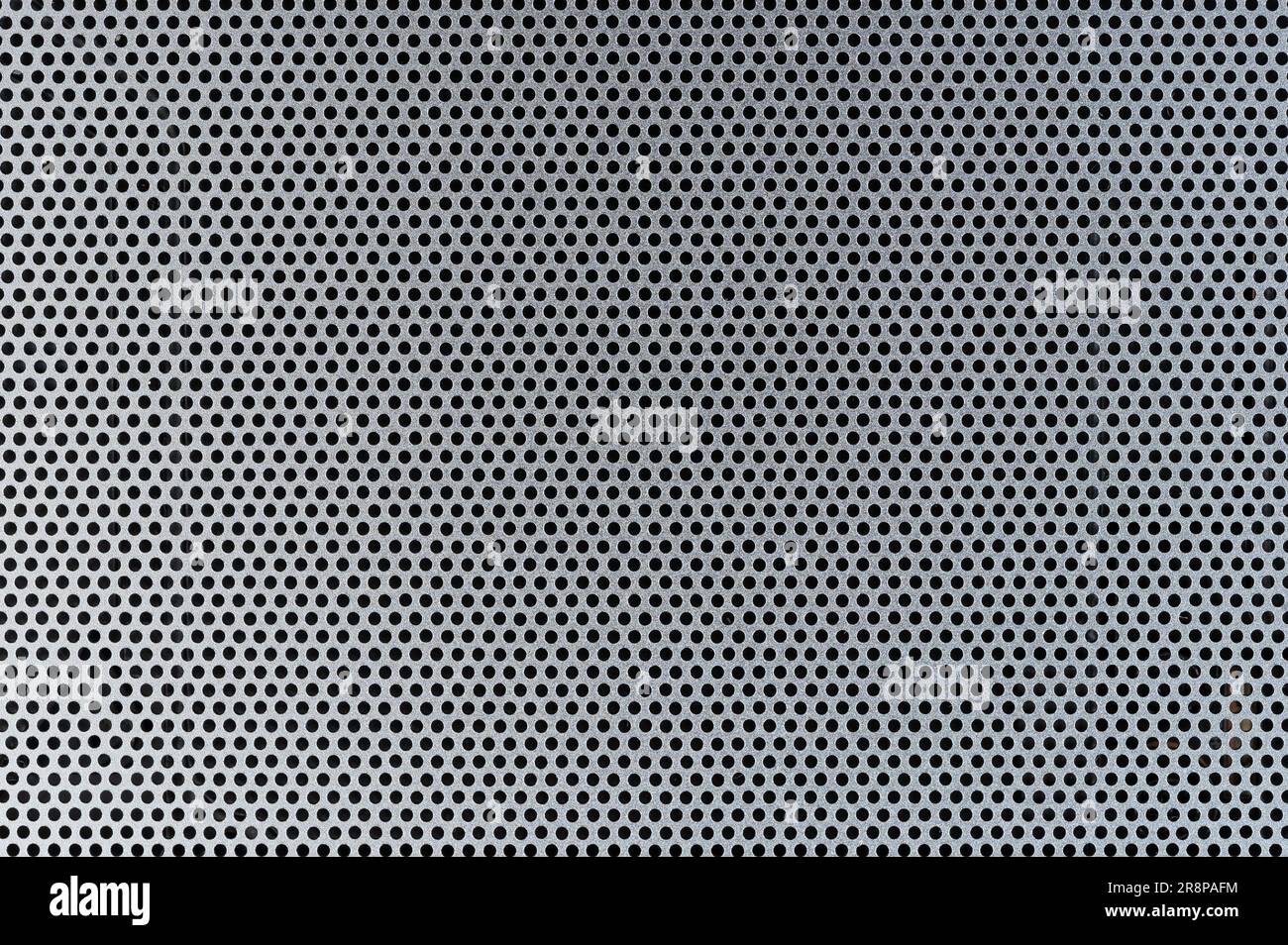Metal grid texture with perforate circle holes close up view Stock ...
