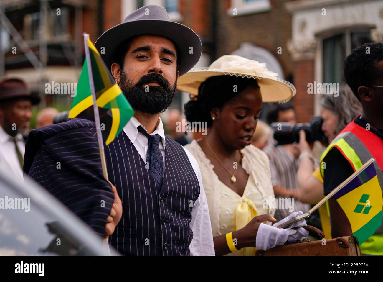 People take part in the procession that commemorates Windrush Day in ...