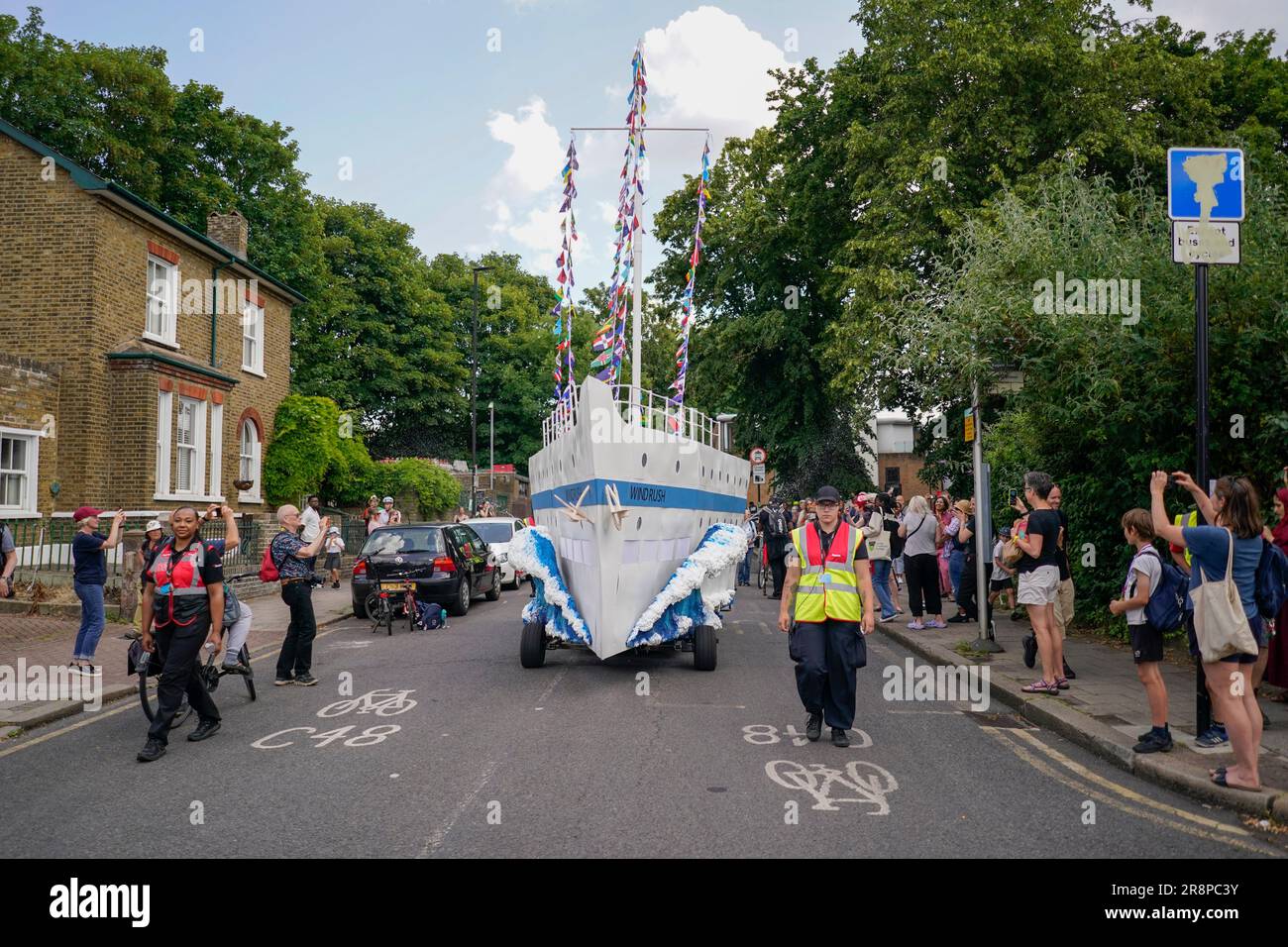 People take part in the procession that commemorates Windrush Day in ...