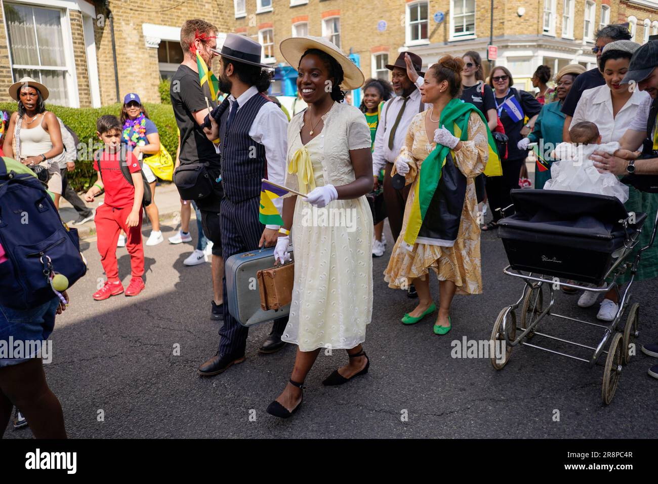 People take part in the procession that commemorates Windrush Day in ...