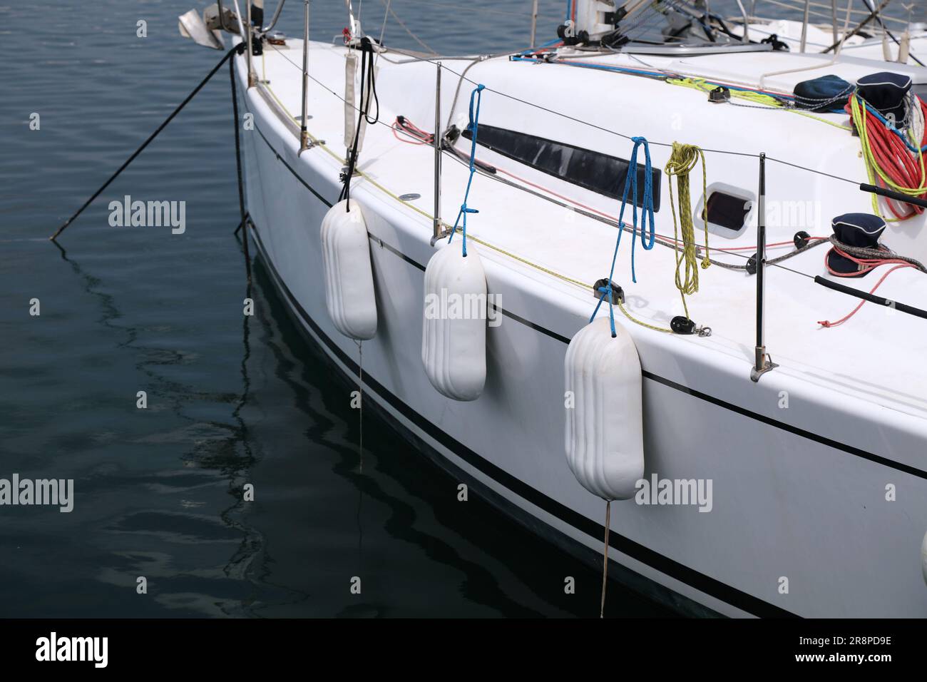 Sailing in Sardinia, Italy. Sailing yacht fenders on port side ...